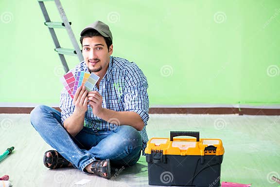 The Young Man Doing Home Renovation Stock Image - Image of paint ...