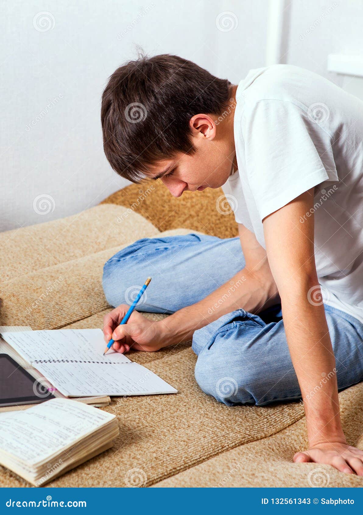 Student doing Homework stock image. Image of head, learn - 132561343