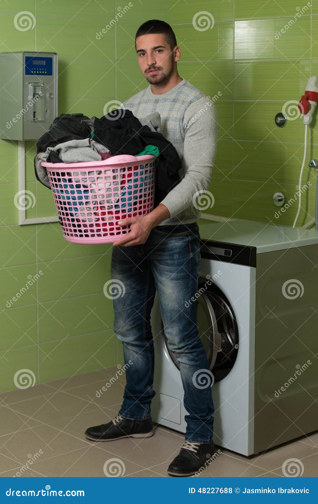 Young Man Doing Housework Laundry Stock Photo - Image of clean, casual ...