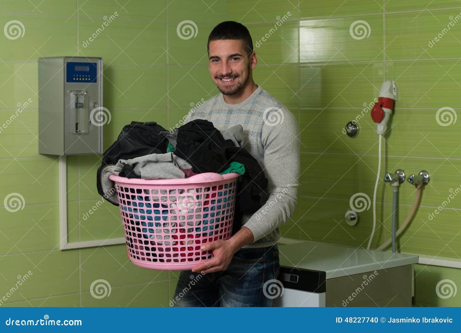 Young Man Doing Housework Laundry Stock Photo - Image of clothing ...