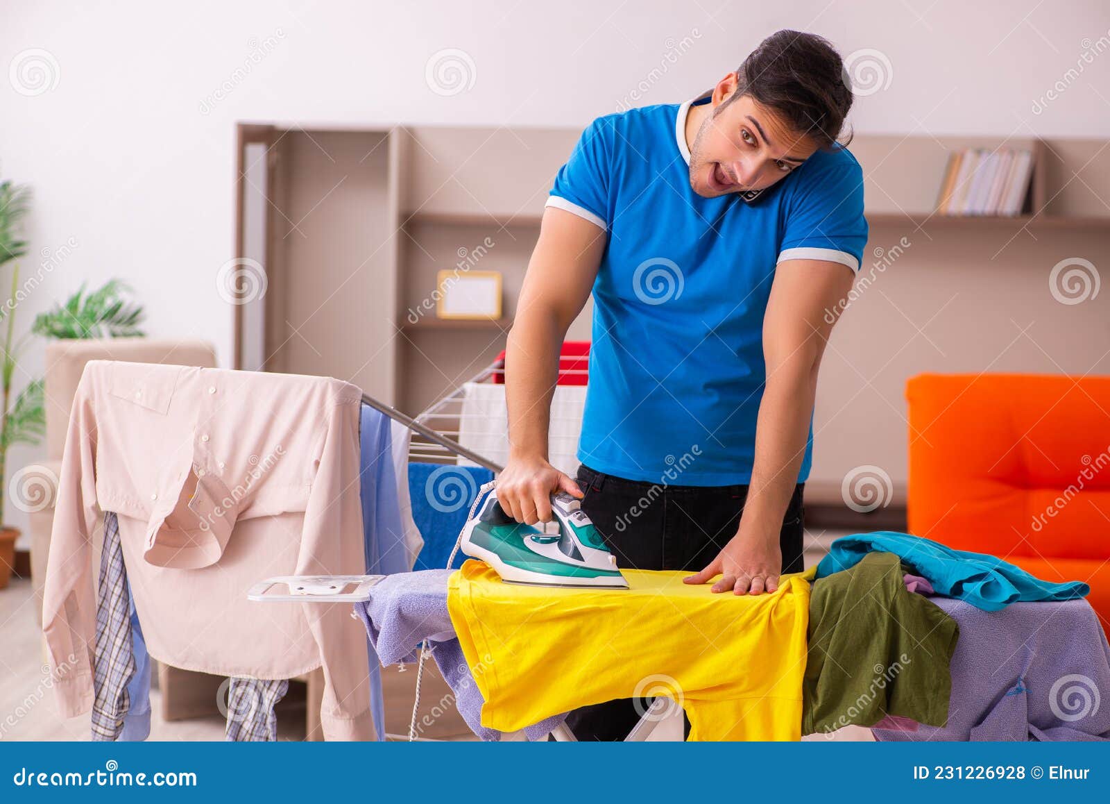 Young Man Husband Doing Ironing at Home Stock Photo - Image of laundry ...