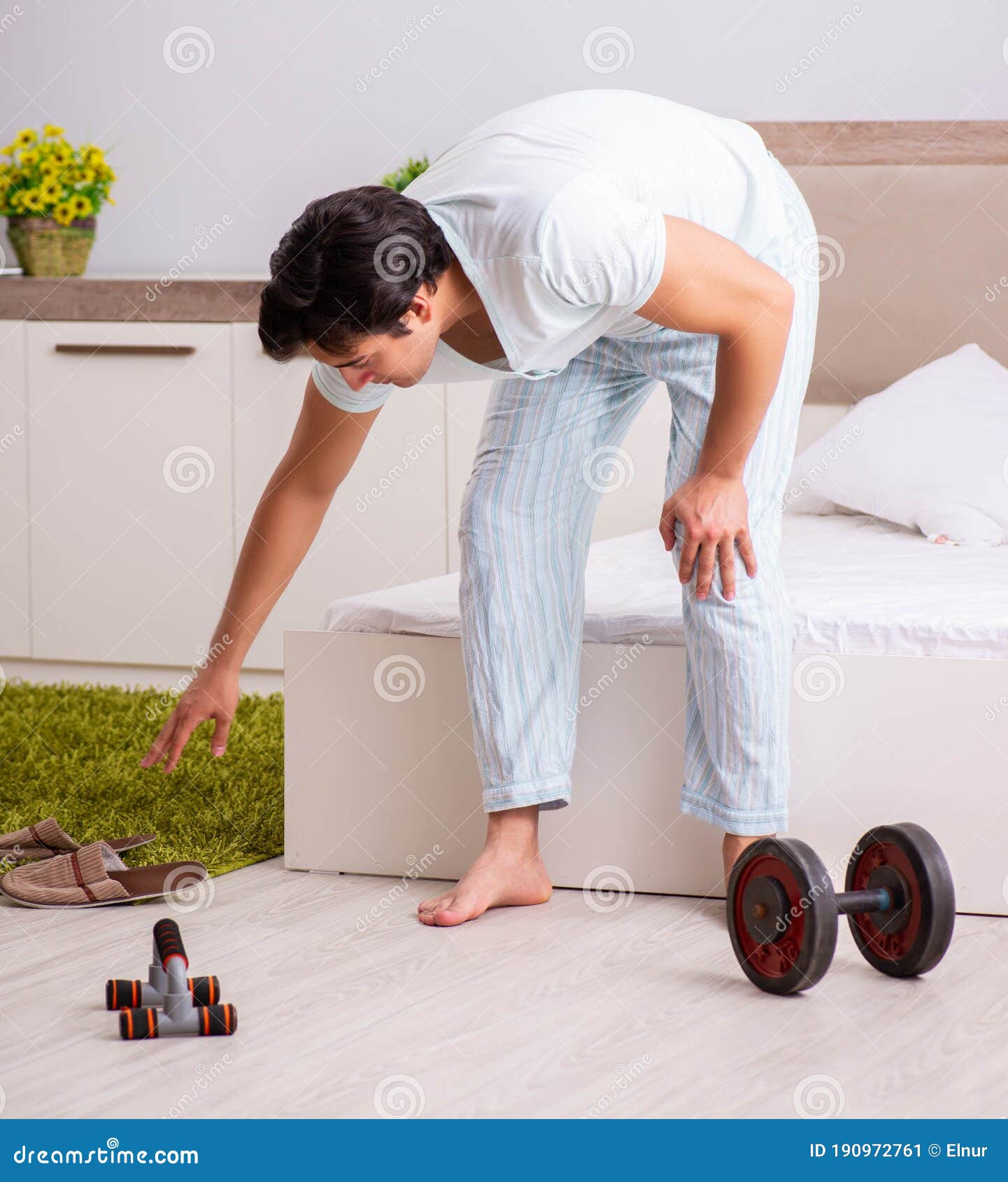 Young Man Doing Morning Routine in Bedroom Stock Image - Image of ...