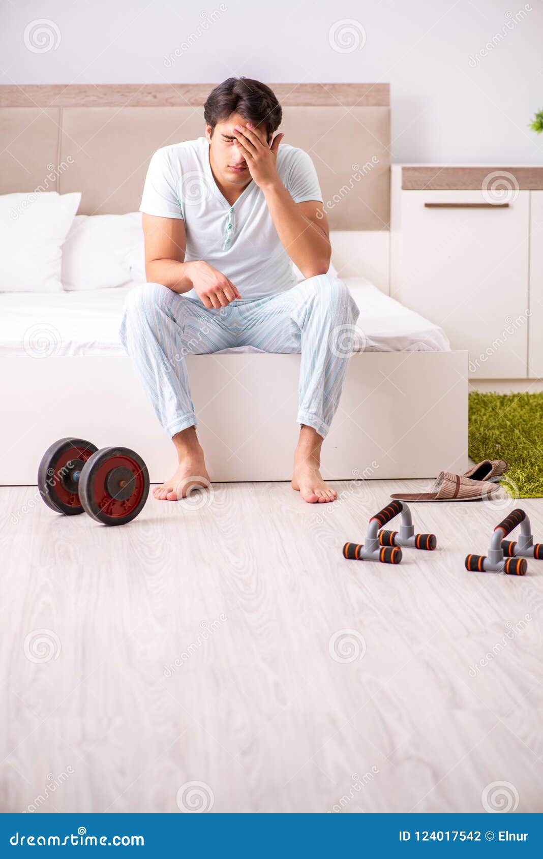 The Young Man Doing Morning Routine in Bedroom Stock Photo - Image of ...