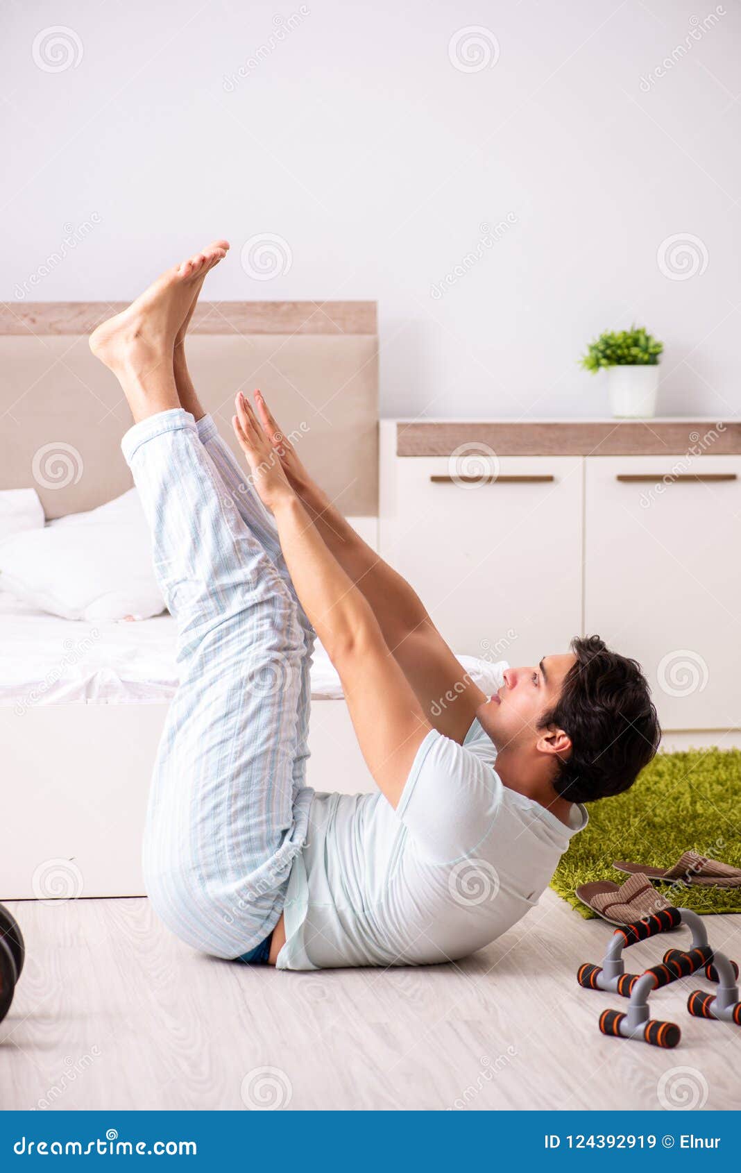 The Young Man Doing Morning Routine in Bedroom Stock Image - Image of ...