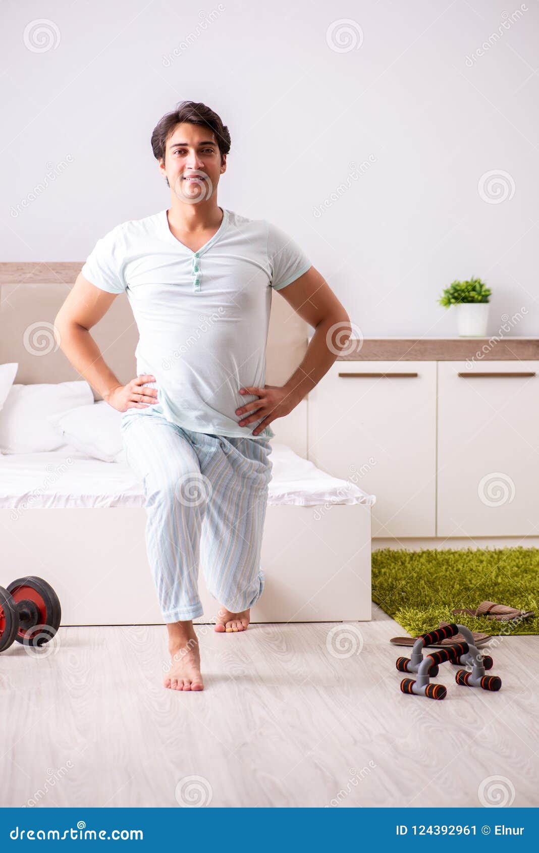 The Young Man Doing Morning Routine in Bedroom Stock Image - Image of ...