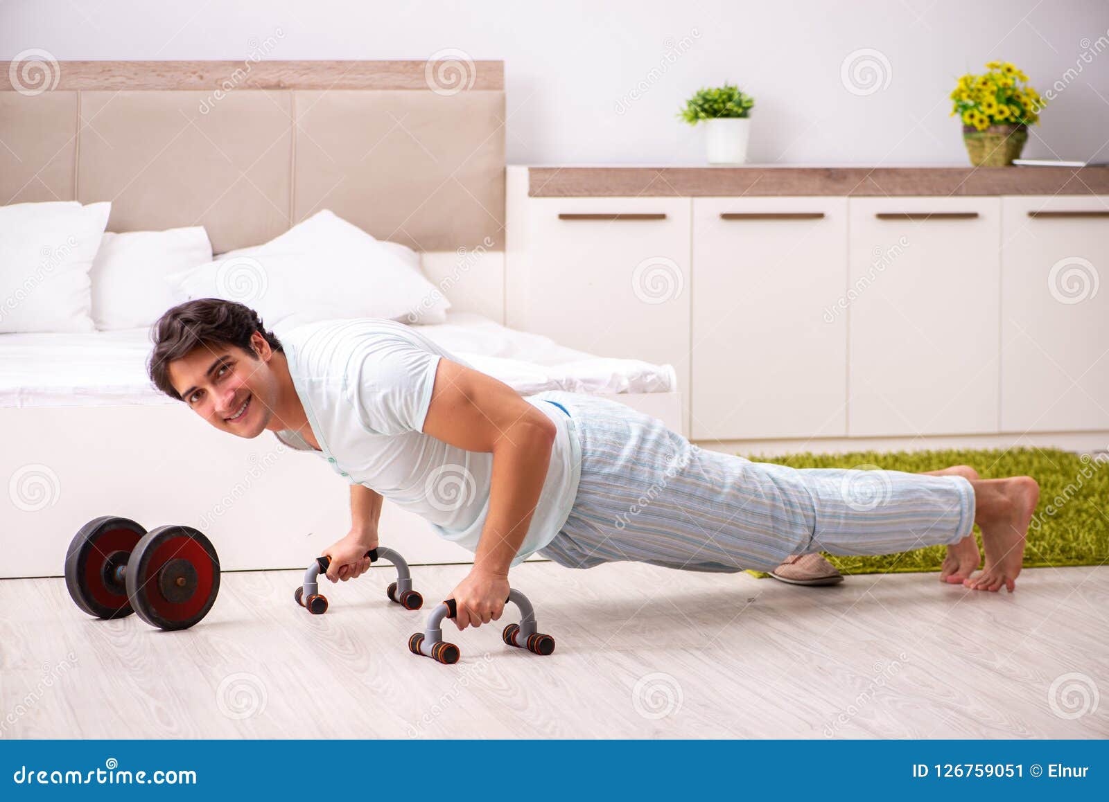The Young Man Doing Morning Routine in Bedroom Stock Image - Image of ...