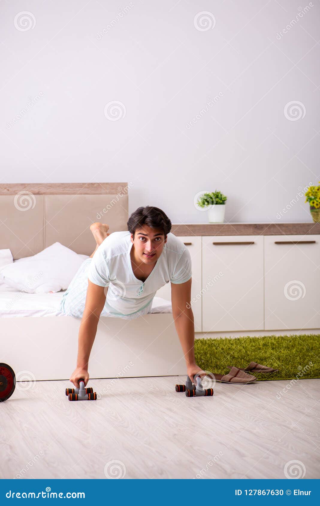 The Young Man Doing Morning Routine in Bedroom Stock Photo - Image of ...