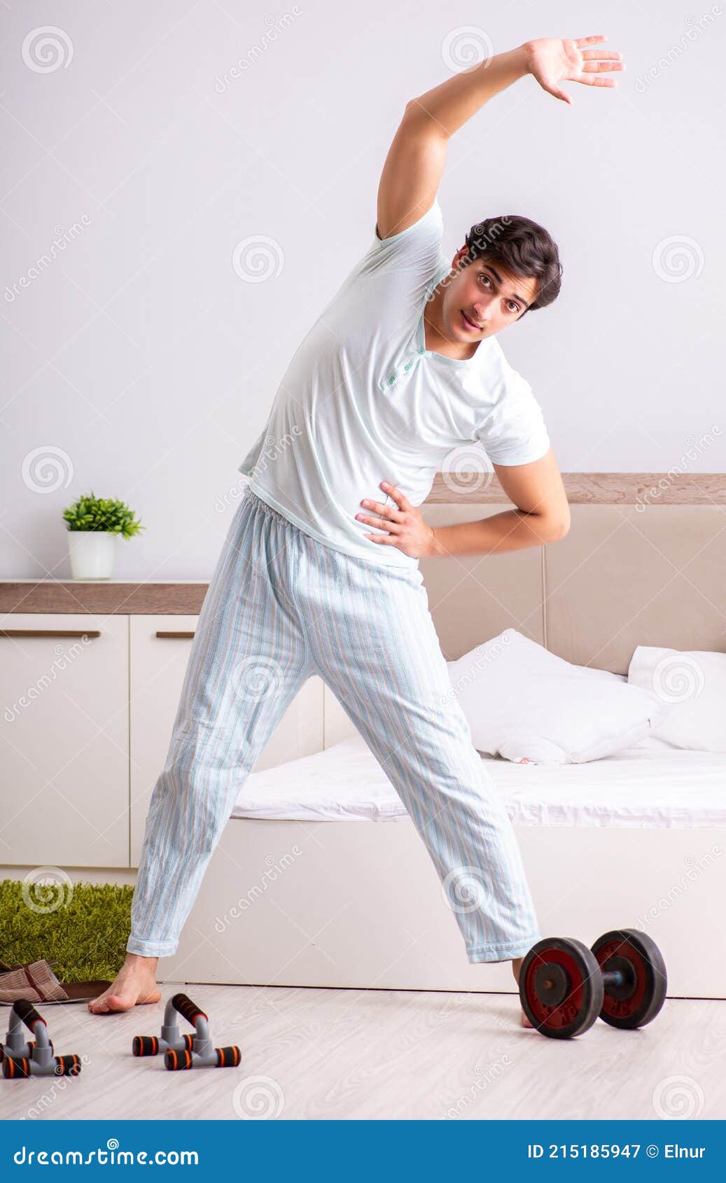 Young Man Doing Morning Routine in Bedroom Stock Image - Image of ...