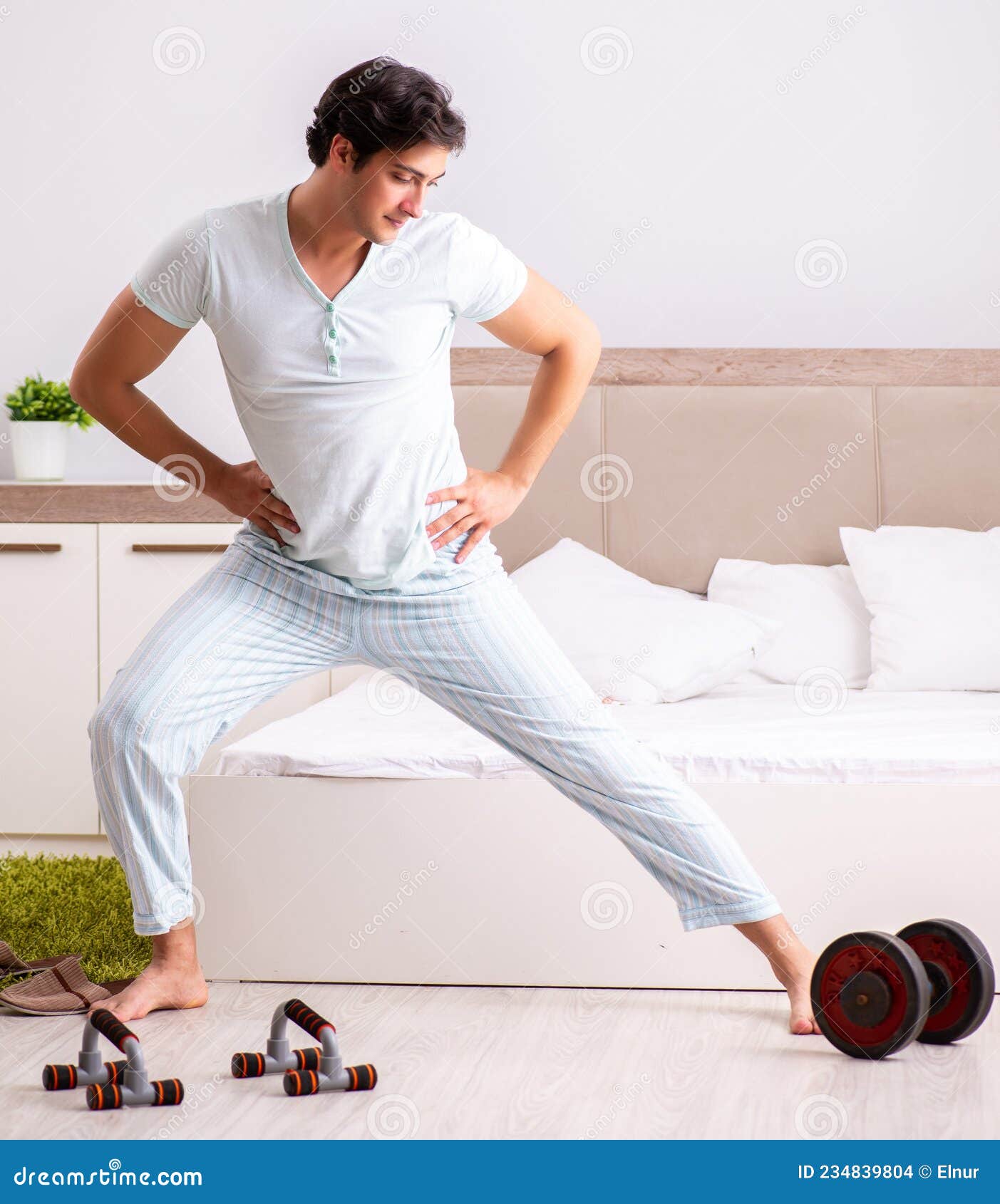 Young Man Doing Morning Routine in Bedroom Stock Photo - Image of male ...