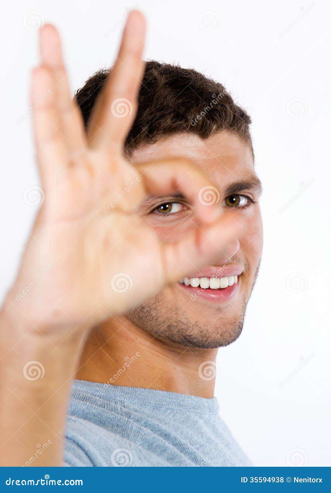 Young Man Doing the Ok Sign on White Background Stock Photo - Image of ...