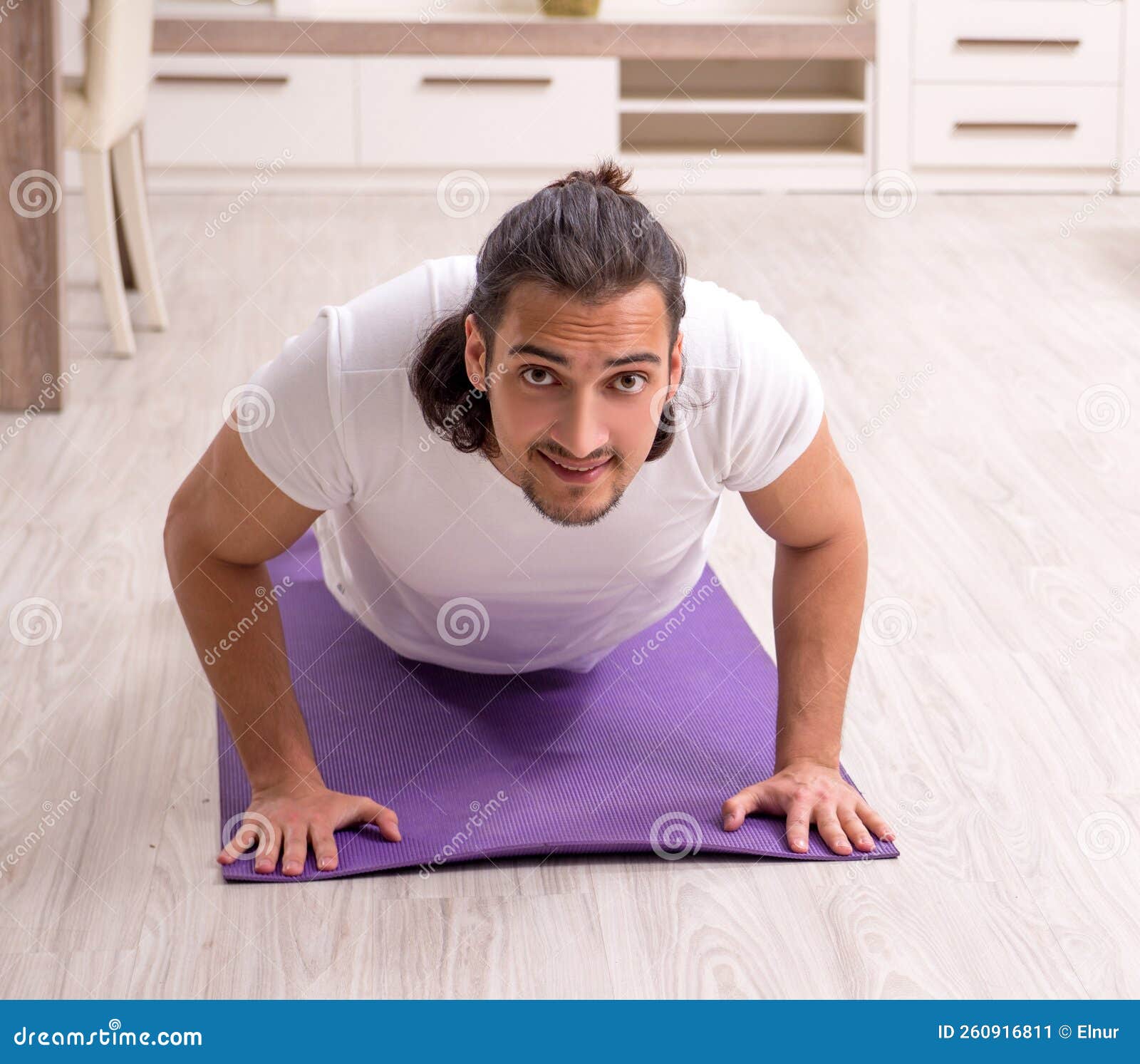 Young Man Doing Physical Exercises at Home Stock Image - Image of ...