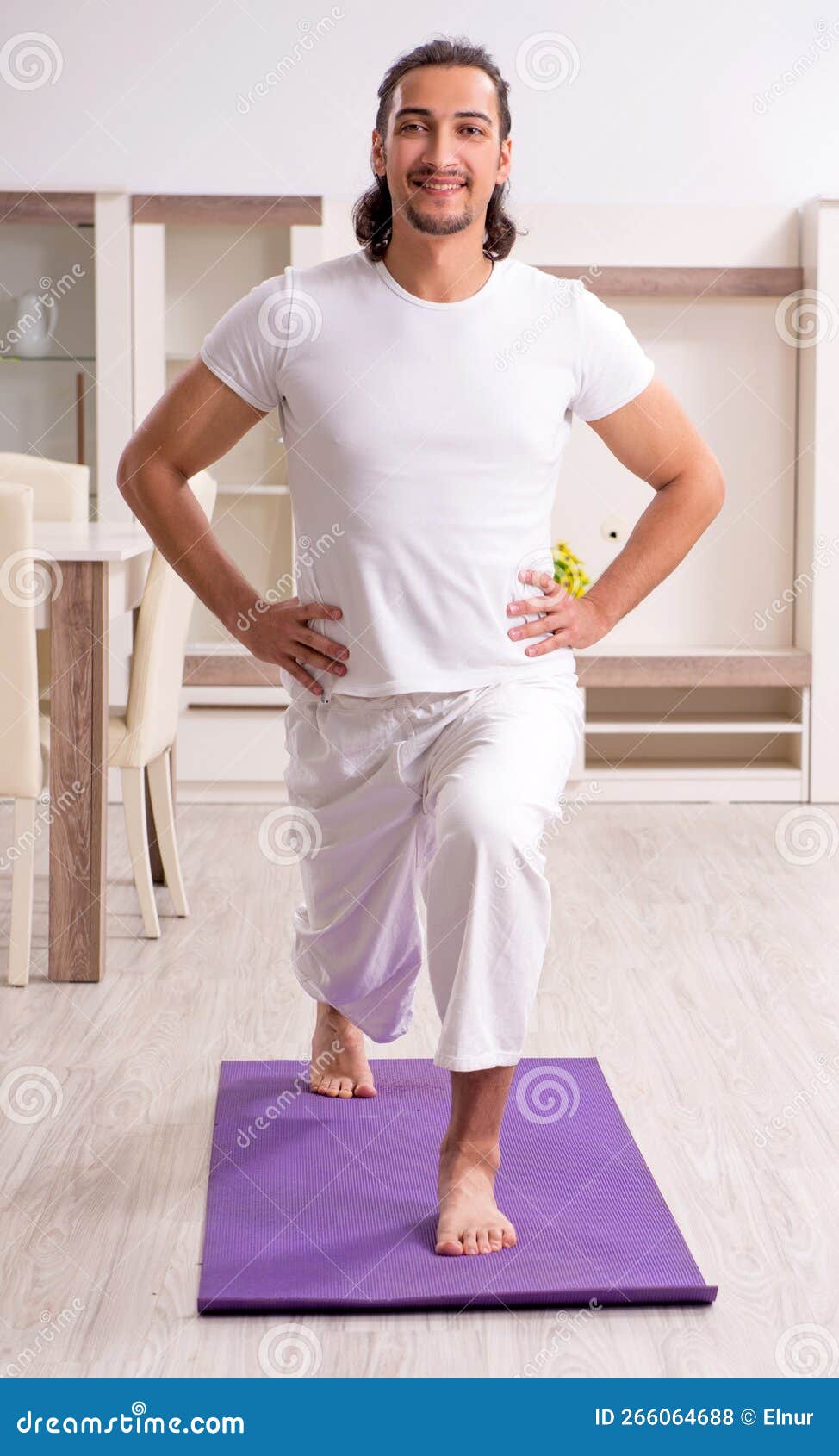Young Man Doing Physical Exercises at Home Stock Photo - Image of ...