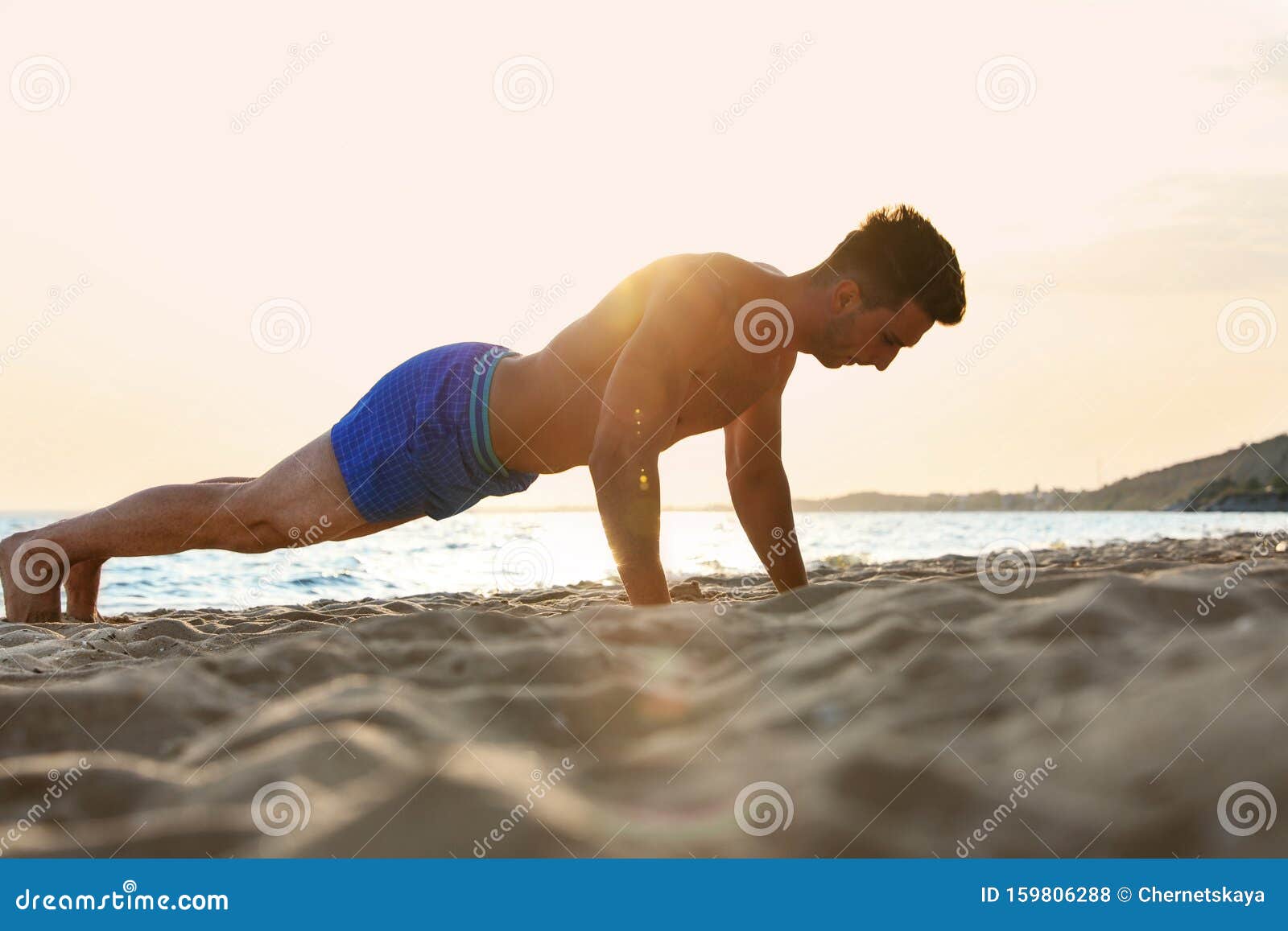 Young man doing push ups stock photo. Image of happy - 159806288