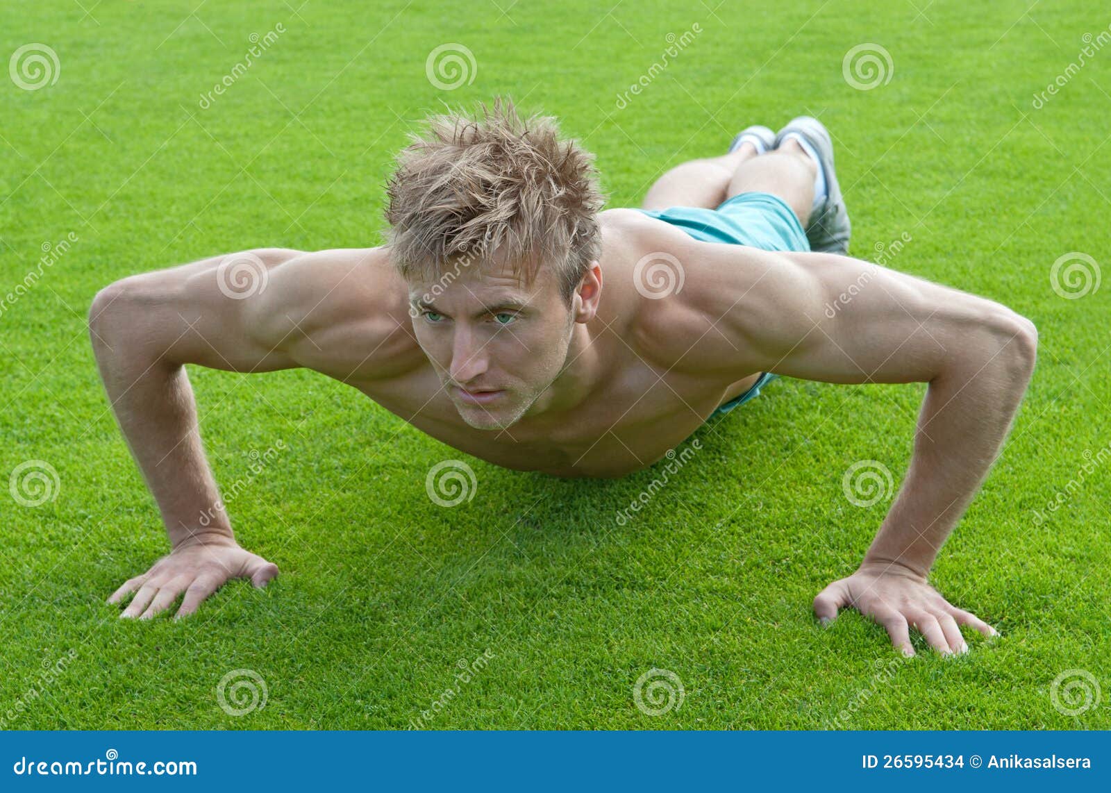 Young Man Doing Push-ups on Green Grass Stock Photo - Image of healthy ...