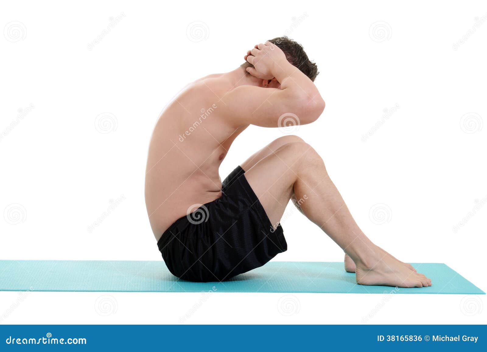 Young Man Doing Situps on Blue Mat Stock Photo - Image of male, fitness ...
