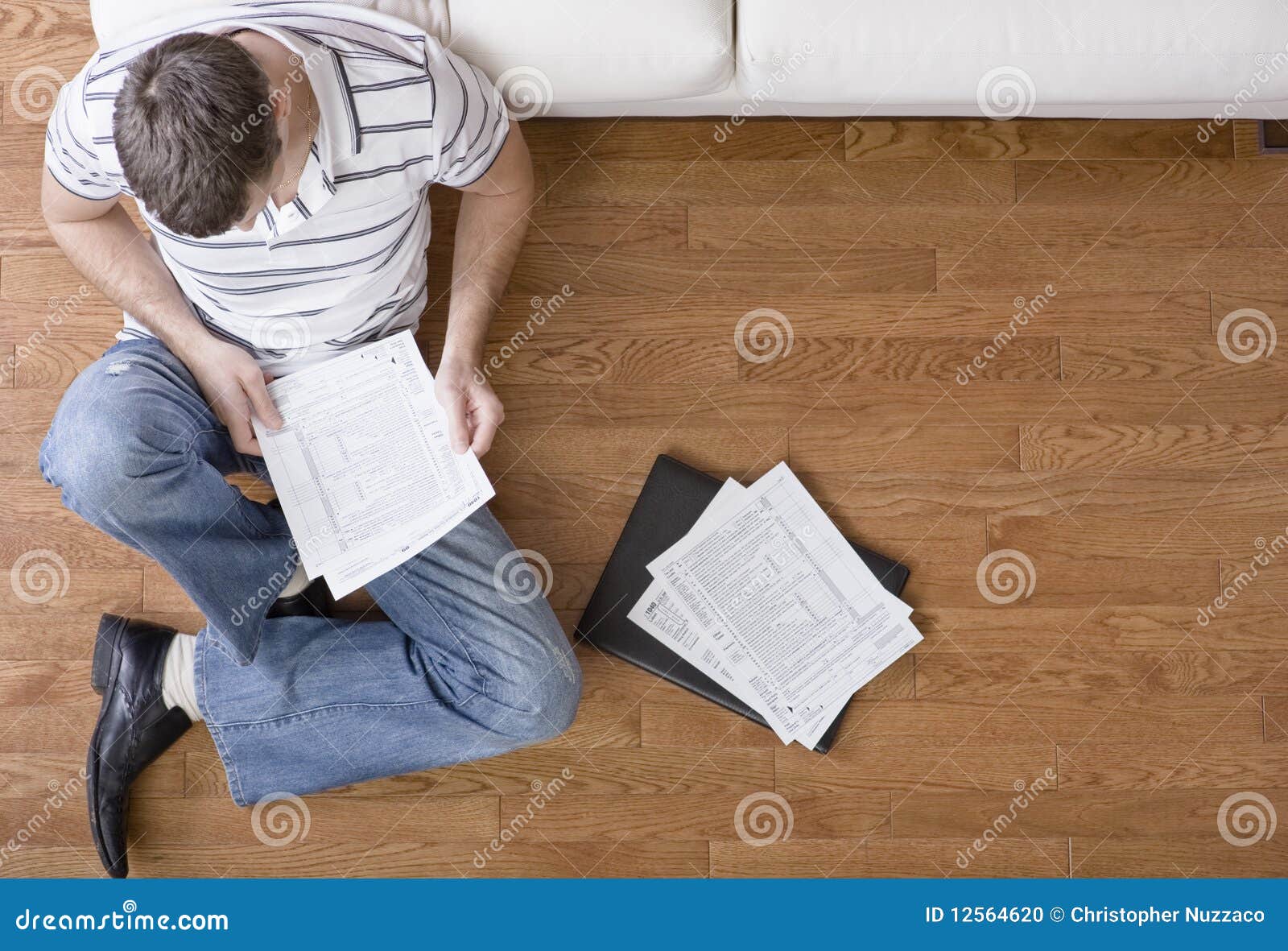 Young Man Doing Taxes stock photo. Image of copy, financial - 12564620