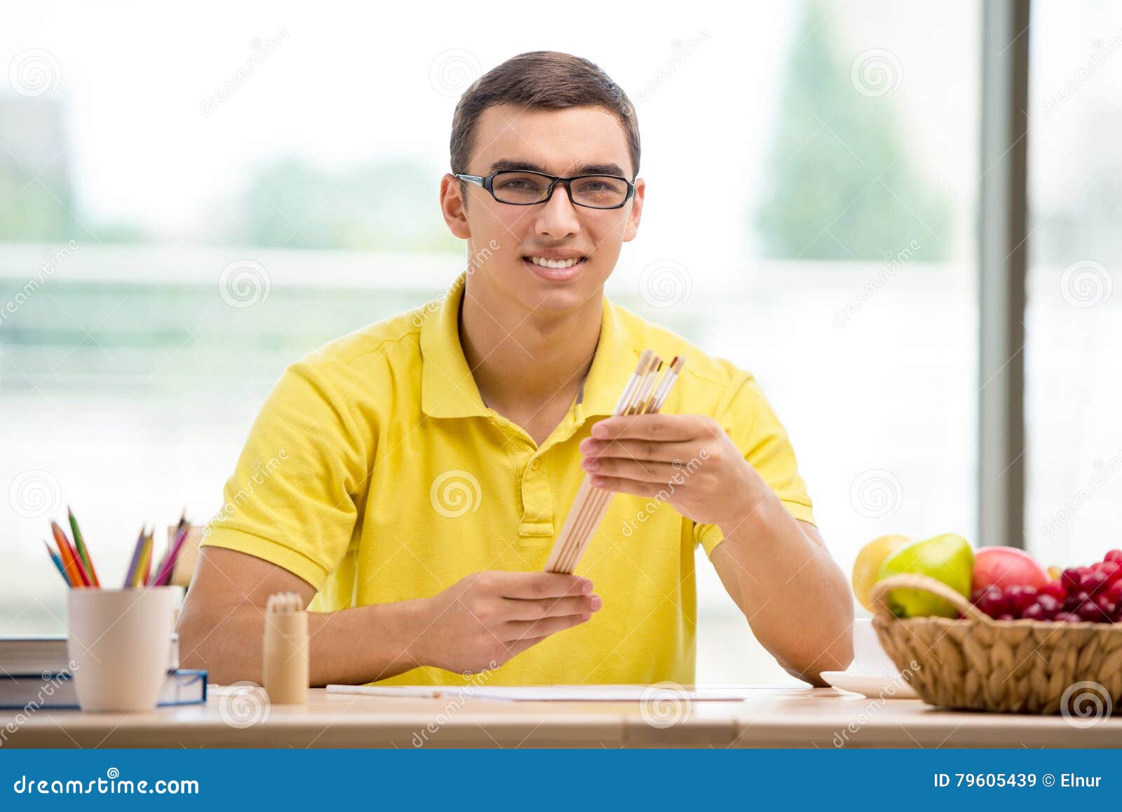The Young Man Drawing Pictures in Studio Stock Image - Image of ...