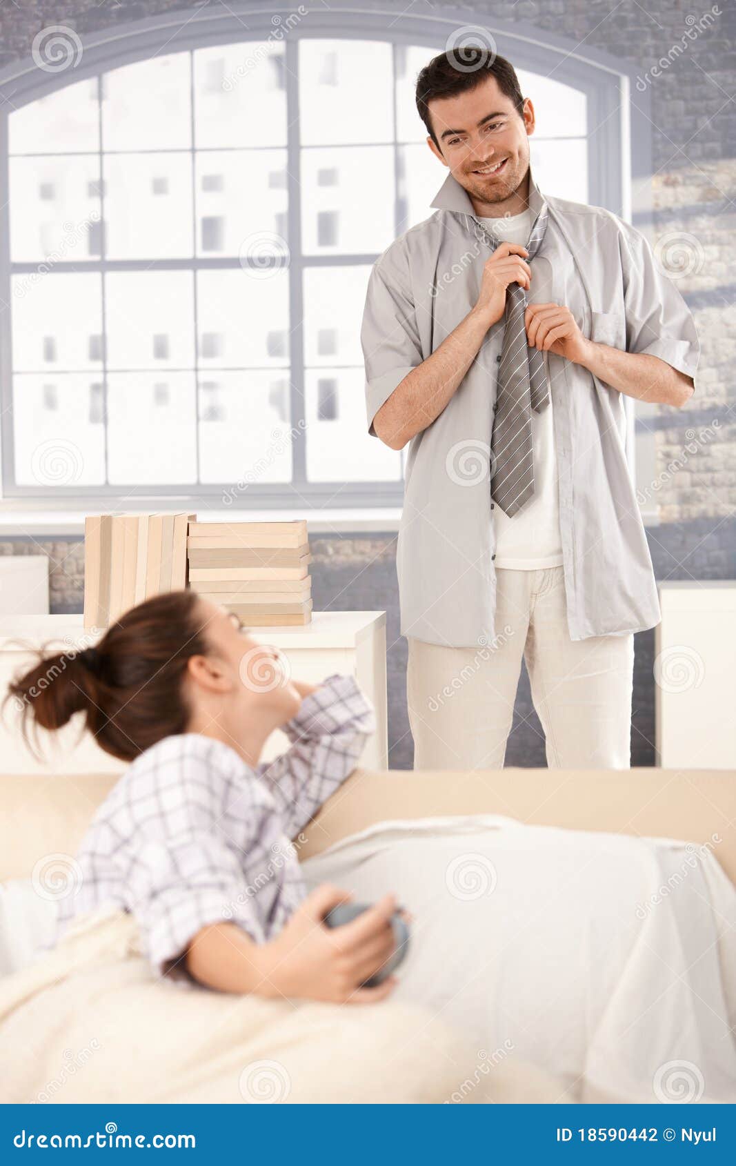 Young Man Dressing Up in the Morning Smiling Stock Photo - Image of ...