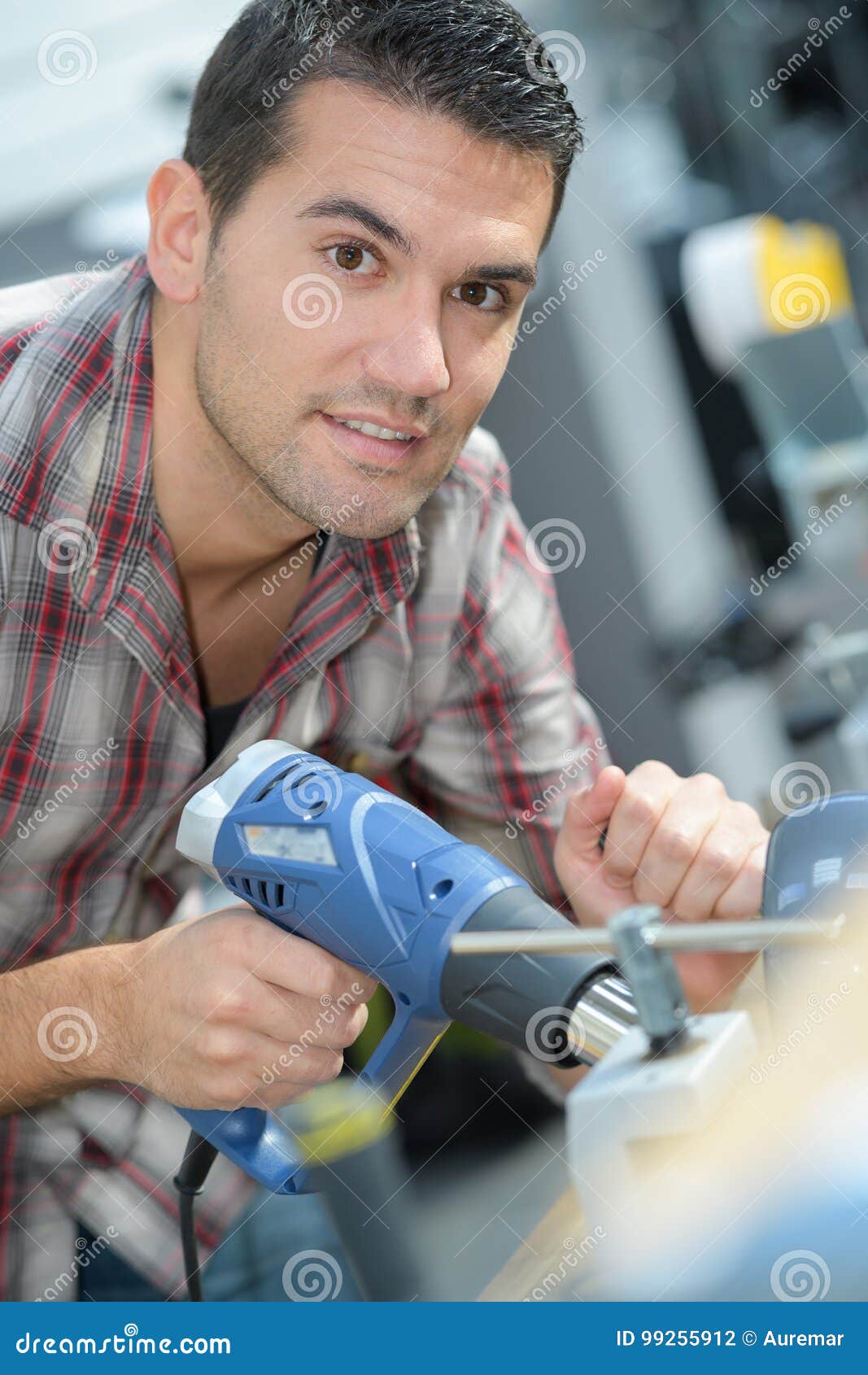 Young Man with Drill in Studio Stock Photo - Image of adult, young ...