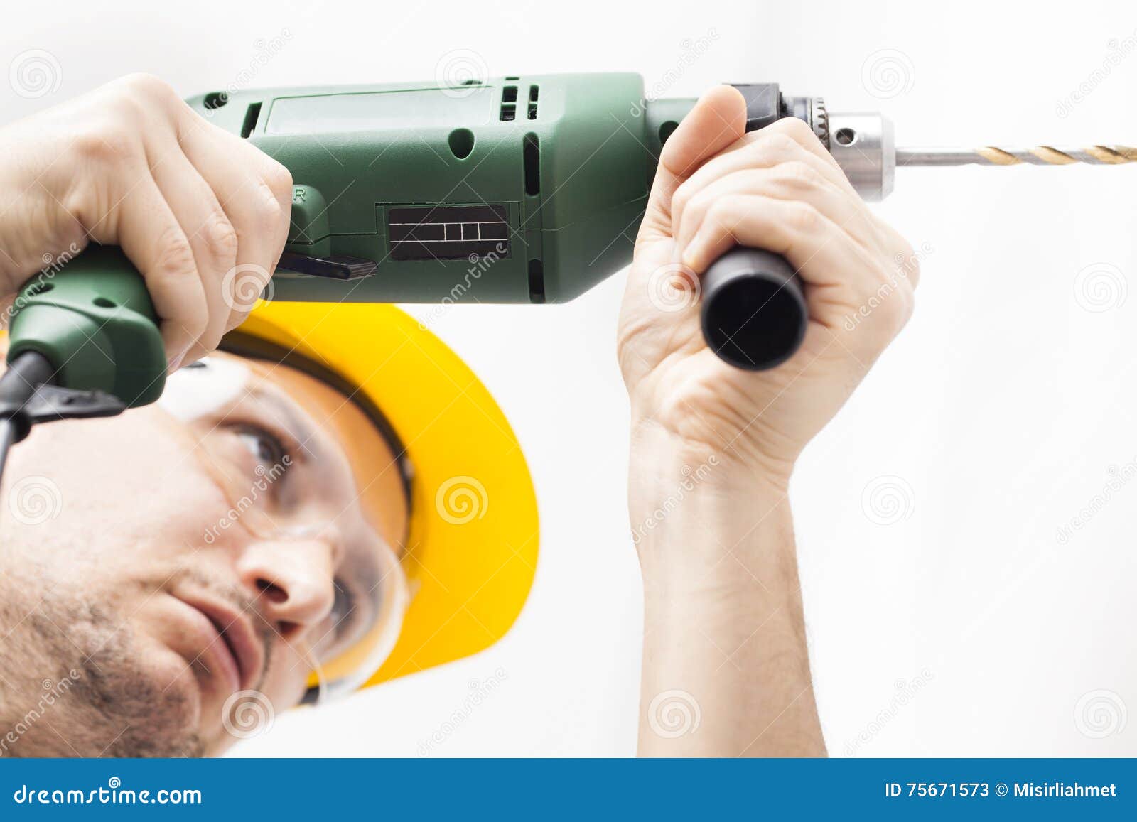 Young Man Drilling Hole in Wall Stock Image - Image of manual, hole ...