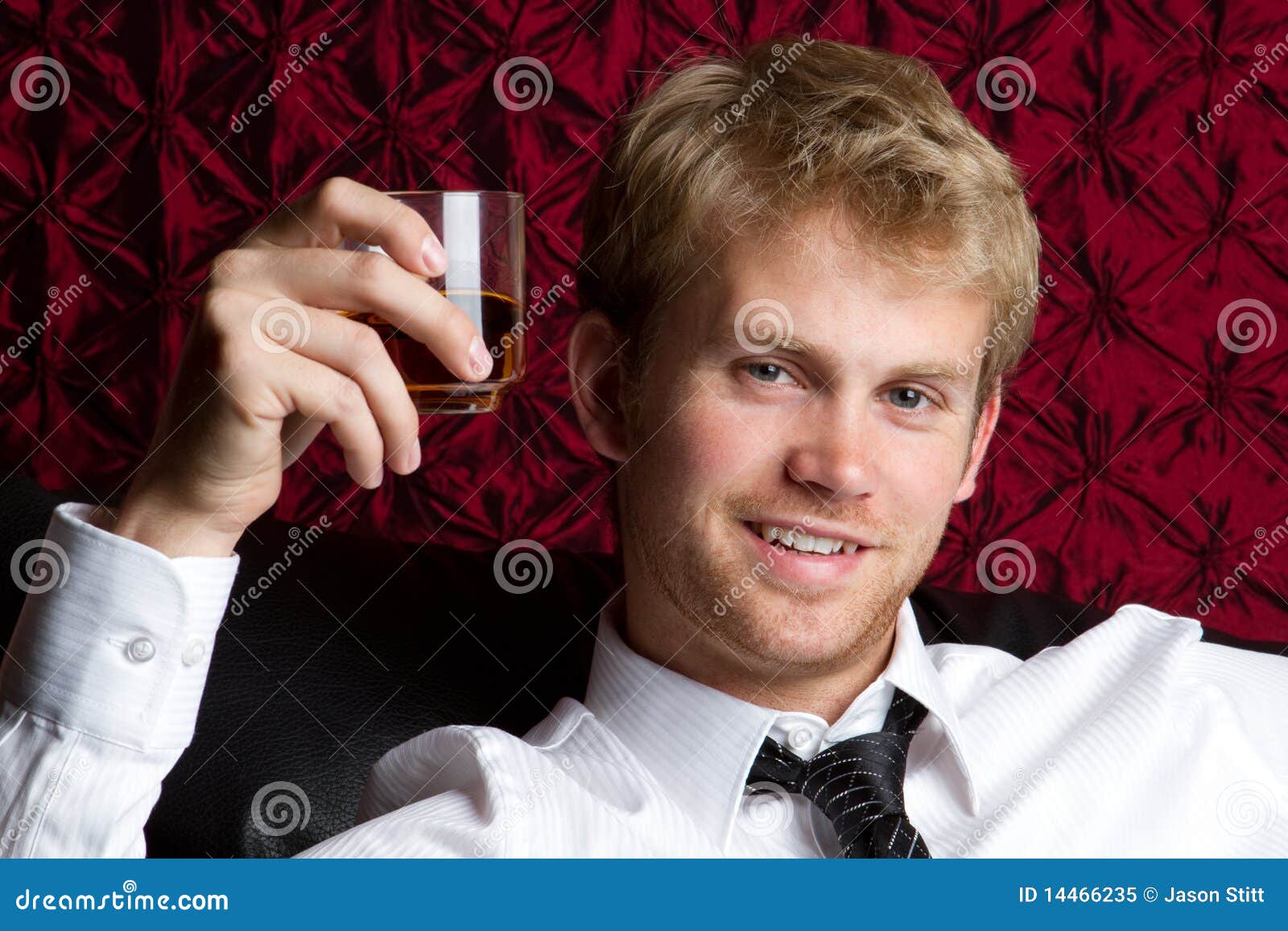 Young Man Drinking stock image. Image of businessman - 14466235