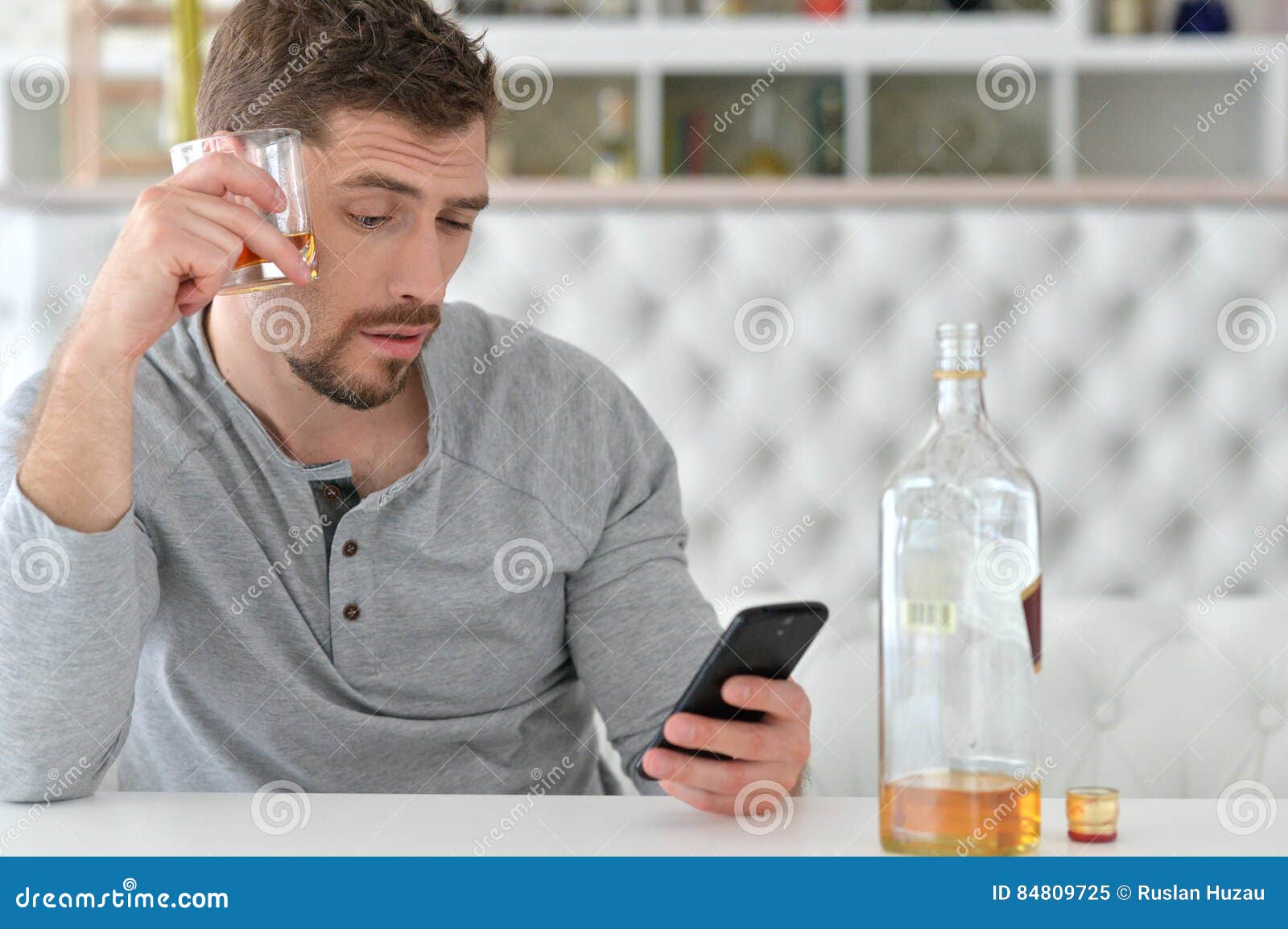 Young man drinking alcohol stock image. Image of drinking - 84809725