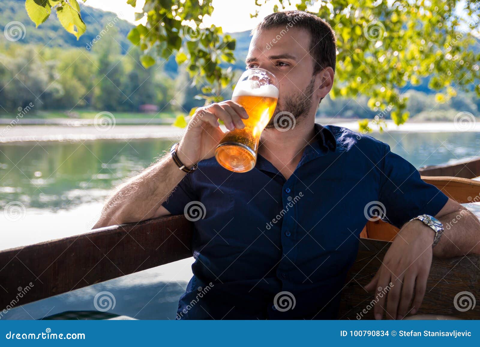 Young Man Drinking Beer and Chilling Stock Photo - Image of male ...