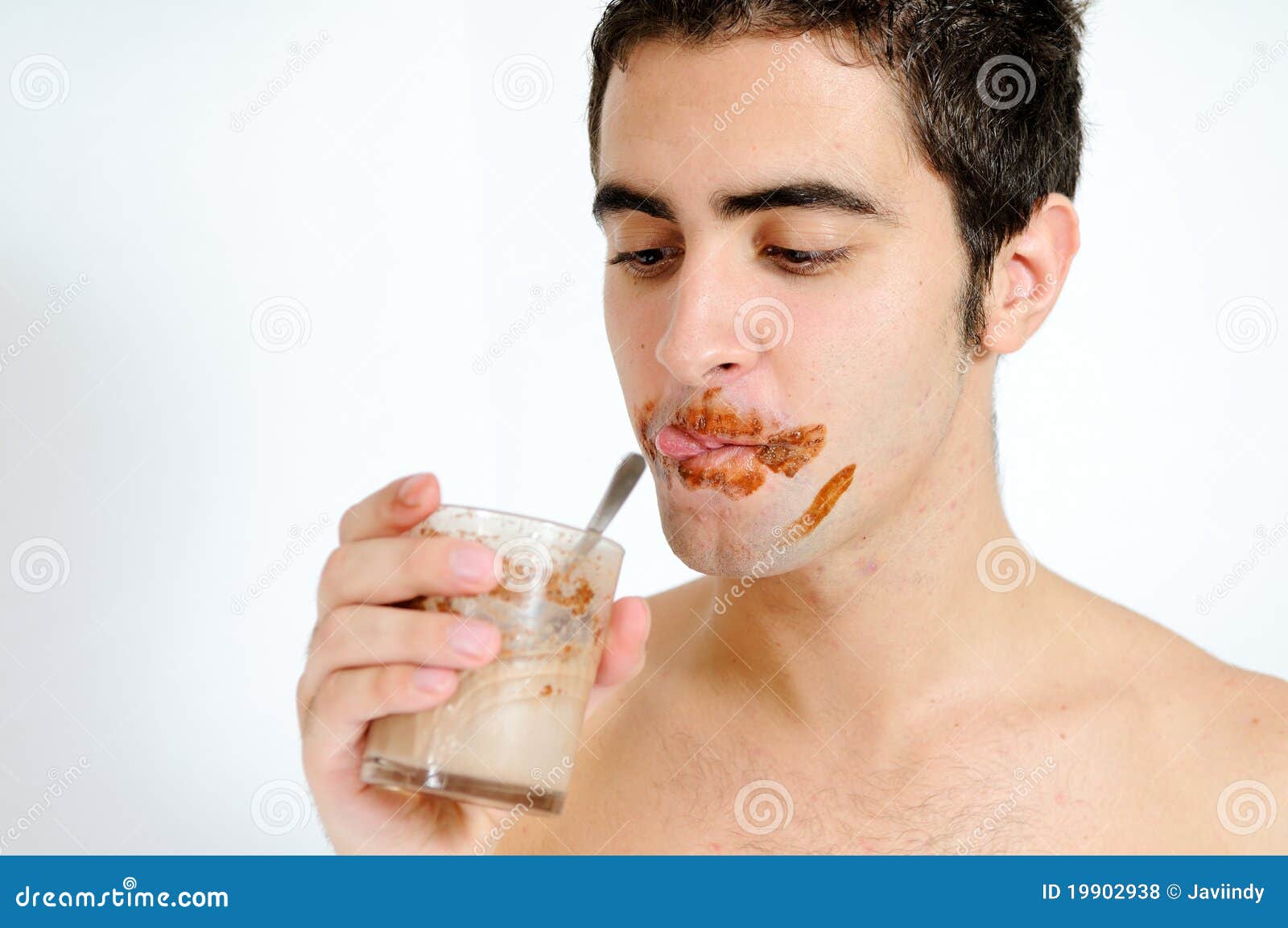 Young Man Drinking Chocolate Milkshake Stock Photo - Image of descent ...
