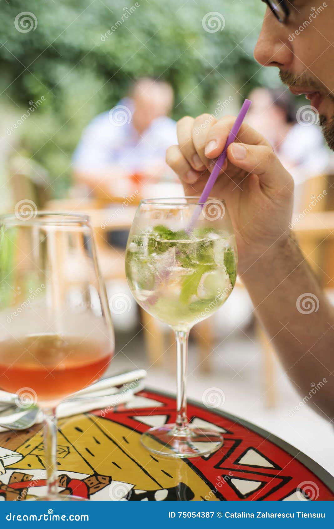 Young Man Drinking Cocktail at the Restaurant Stock Image - Image of ...