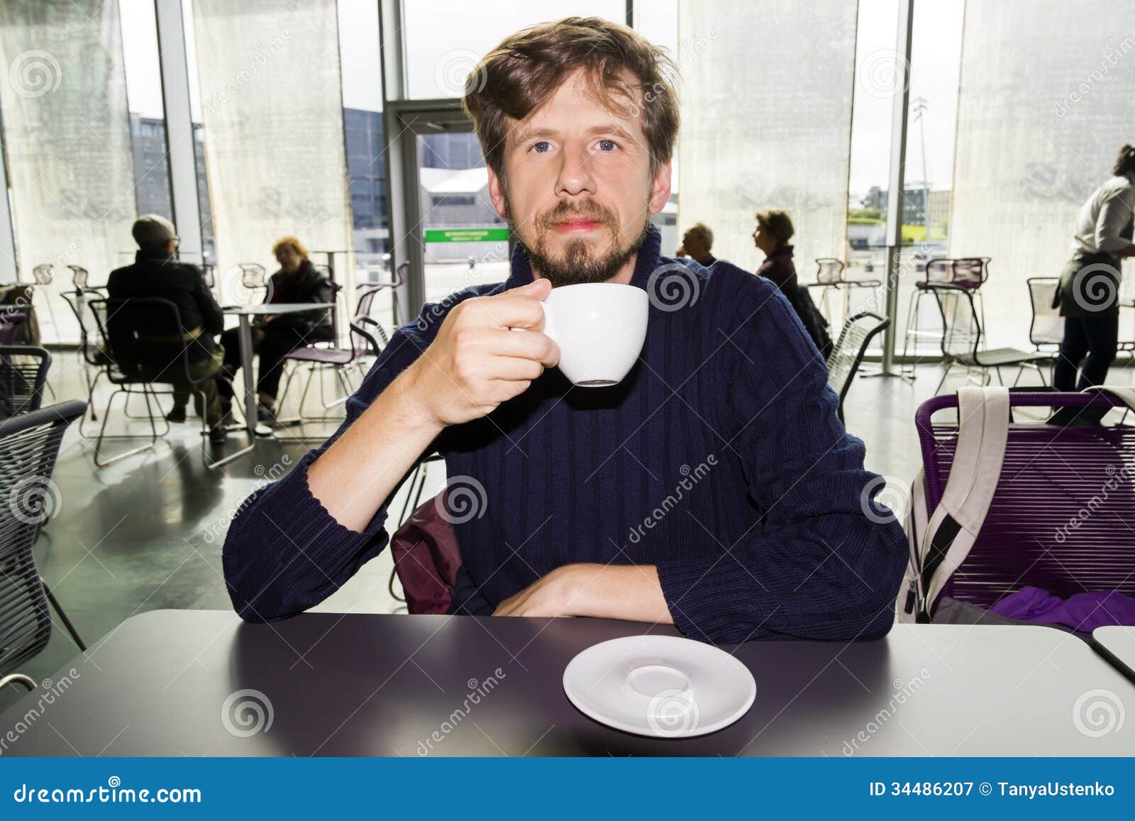 Young Man Drinking Coffee in a Cafe Stock Image - Image of handsome ...