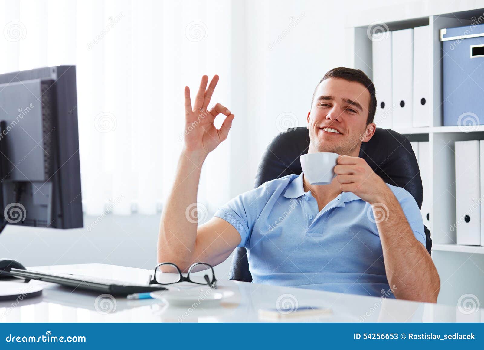 Young Man Drinking Coffee in the Office Stock Image - Image of shirt ...