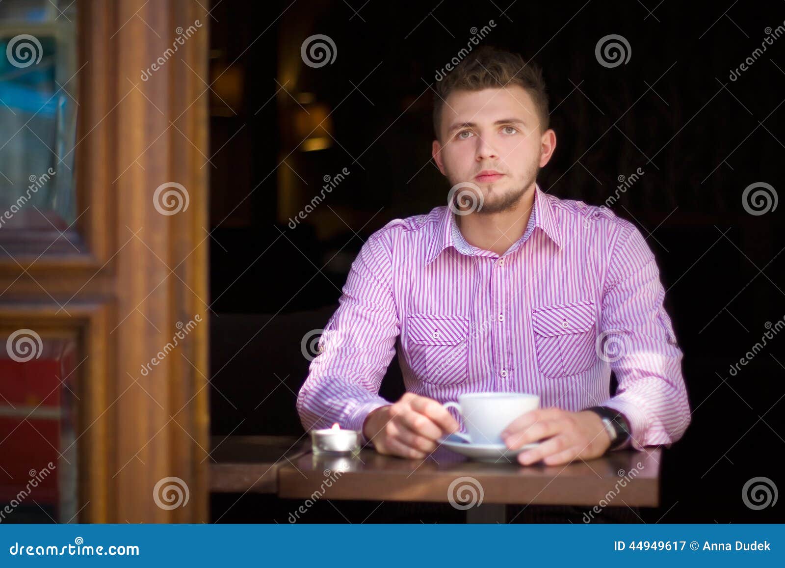 Young man drinking coffee stock image. Image of limb - 44949617 Young man drinking coffee stock image. Image of limb - 44949617