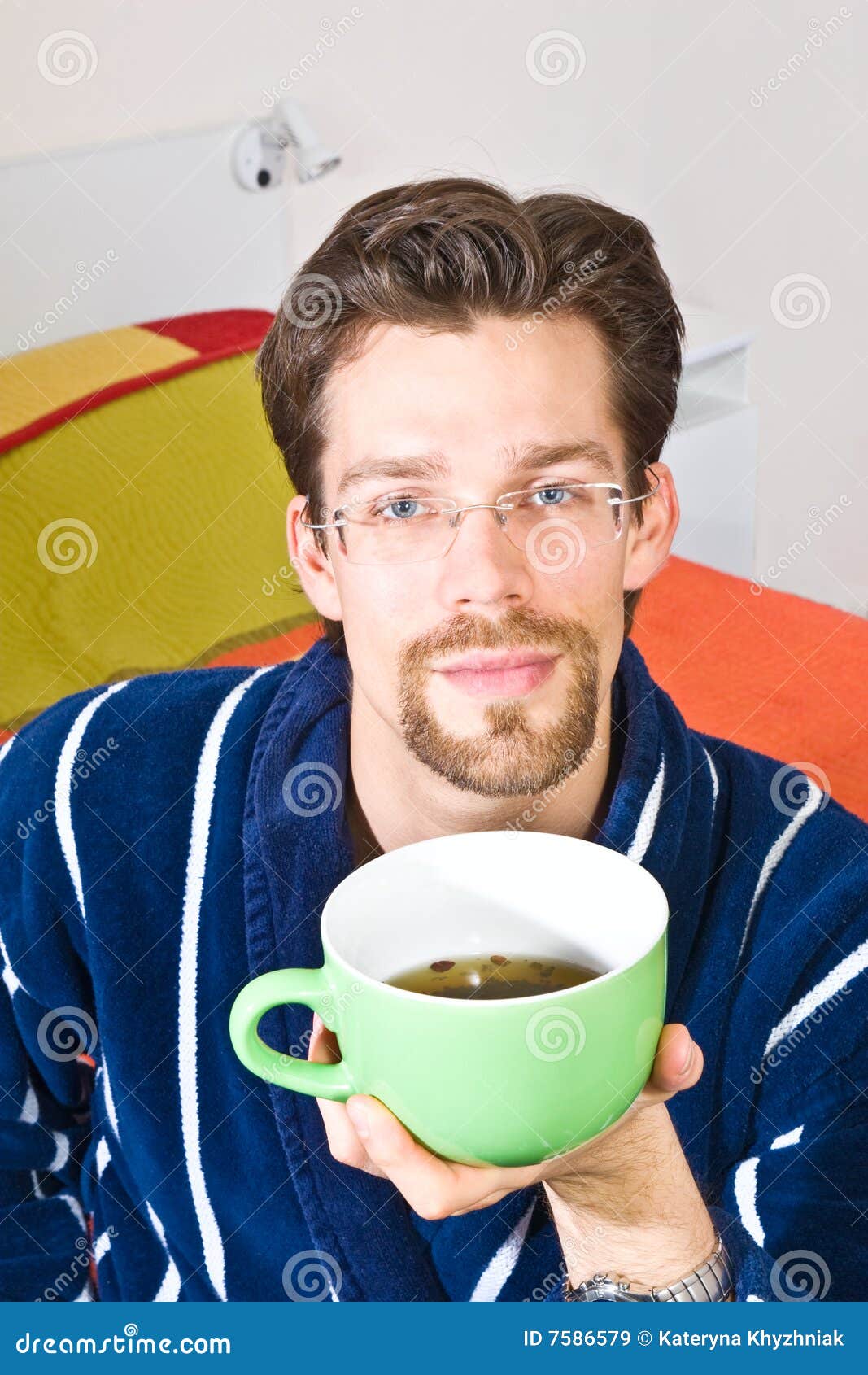 Young Man Drinking His Morning Tea Stock Image - Image of legs, adult ...