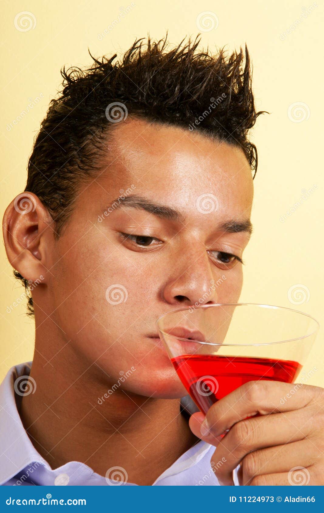 Young Man Drinking Red Cocktail Stock Image - Image of adult, young ...