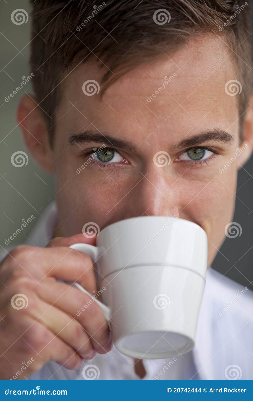 Young Man Drinking Something Stock Photo - Image of eyes, black: 20742444