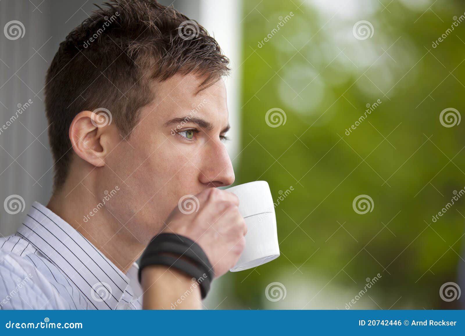 Young Man Drinking Something Stock Photo - Image of handsome, hairstyle ...