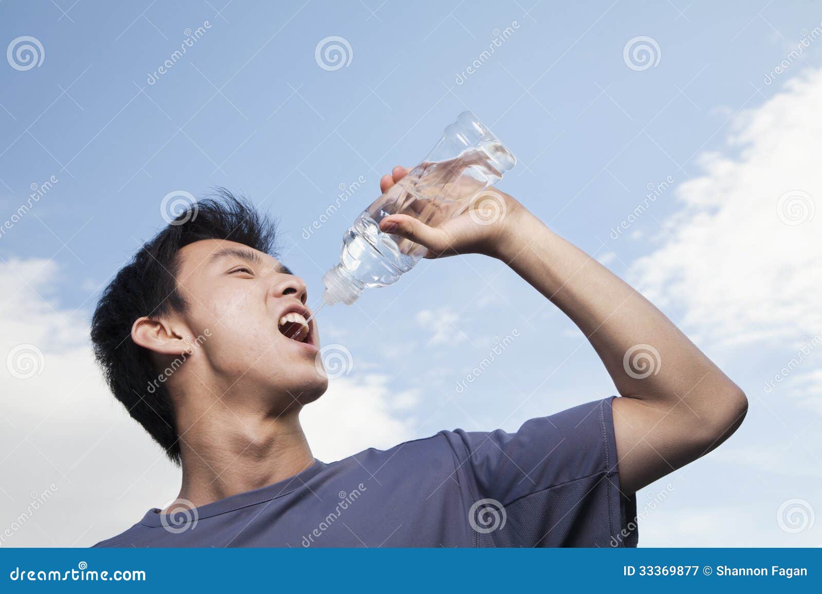 Young Man Drinking Water stock image. Image of healthy - 33369877