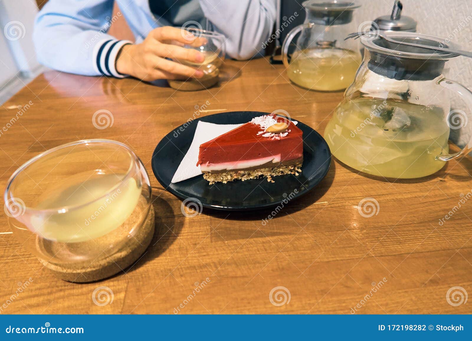 Young Man Drinks Ginger Tea in a Cafe Stock Photo - Image of food ...