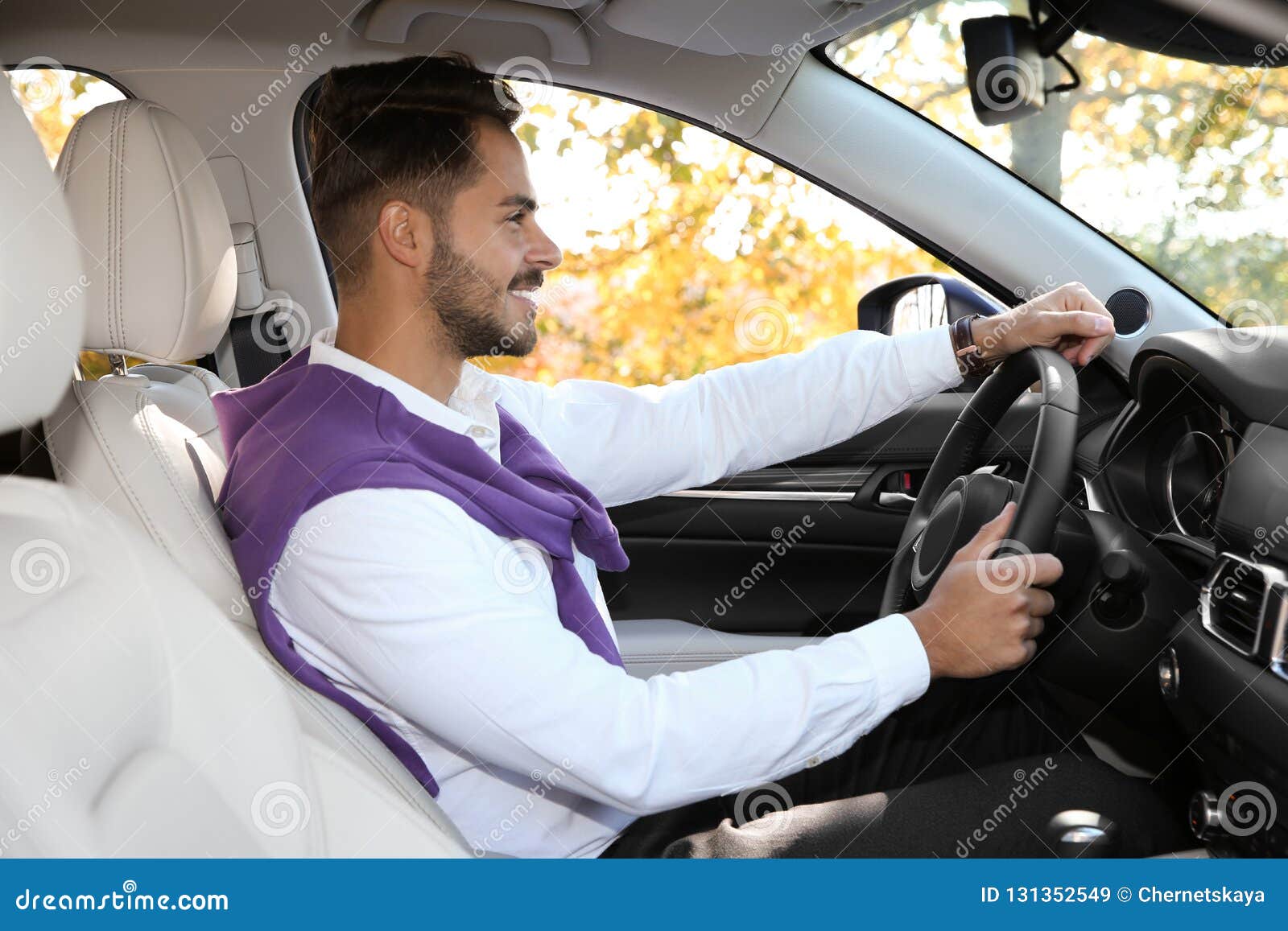 Young man in driver`s seat stock image. Image of caucasian - 131352549