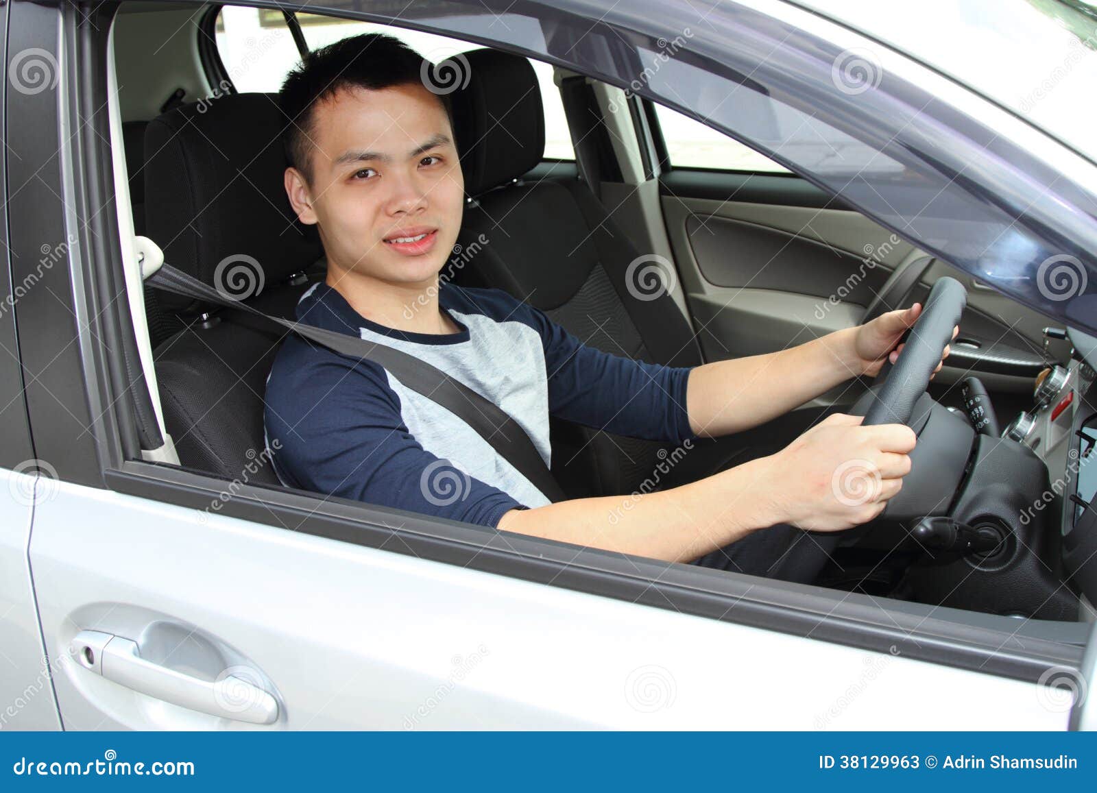 Young man driving stock image. Image of horizontal, male - 38129963