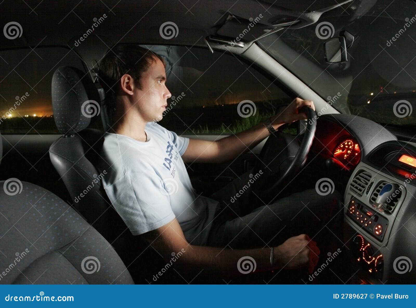 Young man driving a car stock image. Image of arms, automobile - 2789627