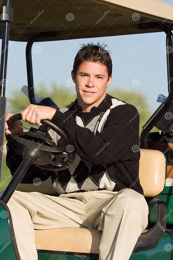 Young Man Driving Golf Cart Stock Photo - Image of game, hobby: 29646340