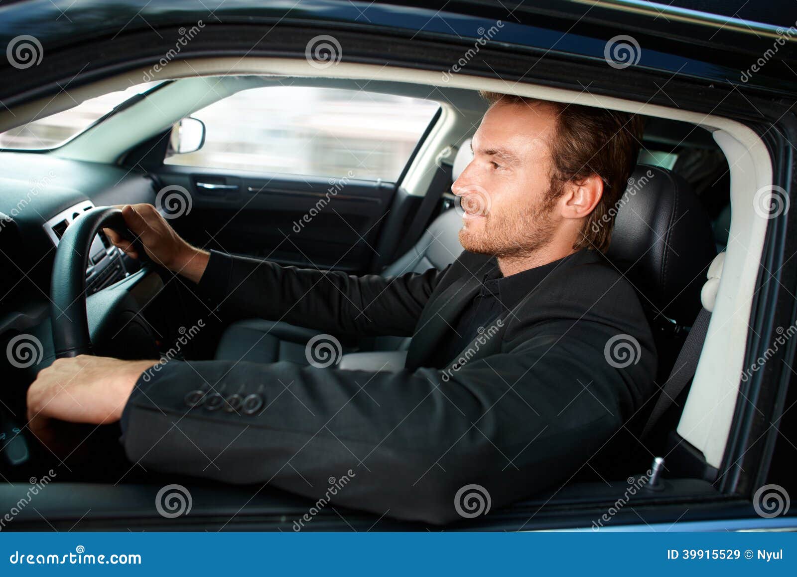 Young Man Driving Luxury Car Smiling Stock Image - Image of collar ...
