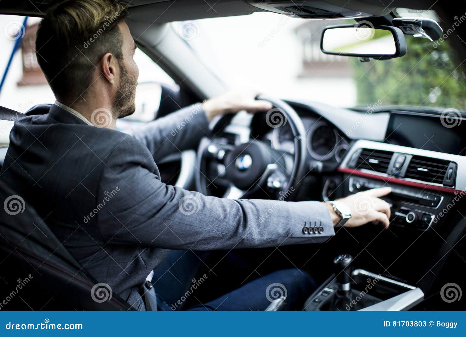 Young man in the car stock image. Image of seat, male - 81703803