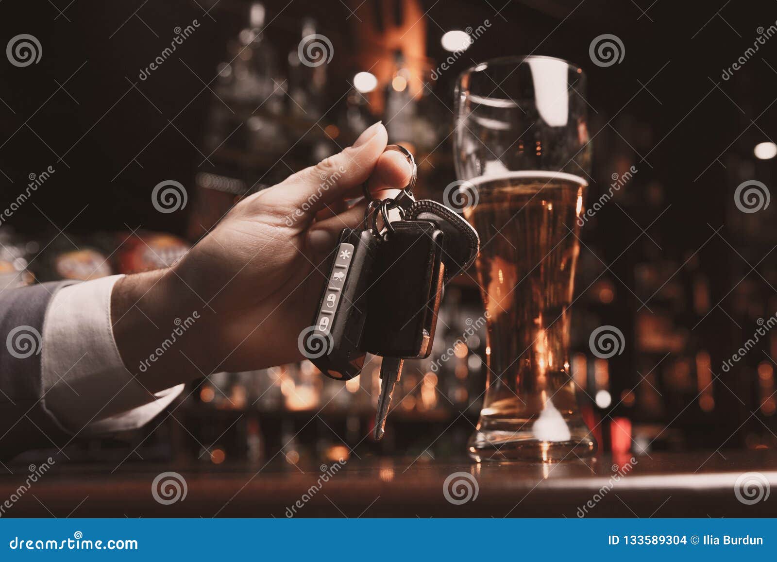 Young Man Drunk with Glass of Beer and Key in His Hand Stock Photo ...