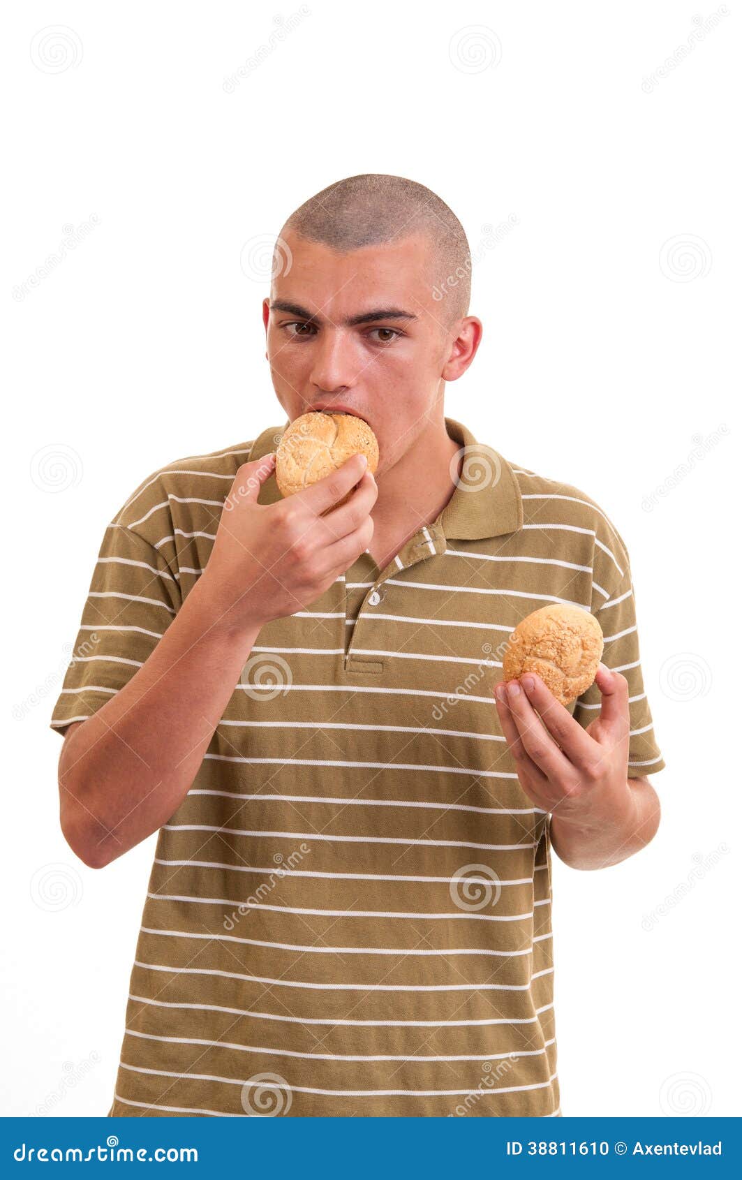 Young Man Eating Buns with Sesame Stock Photo - Image of meal, baked ...