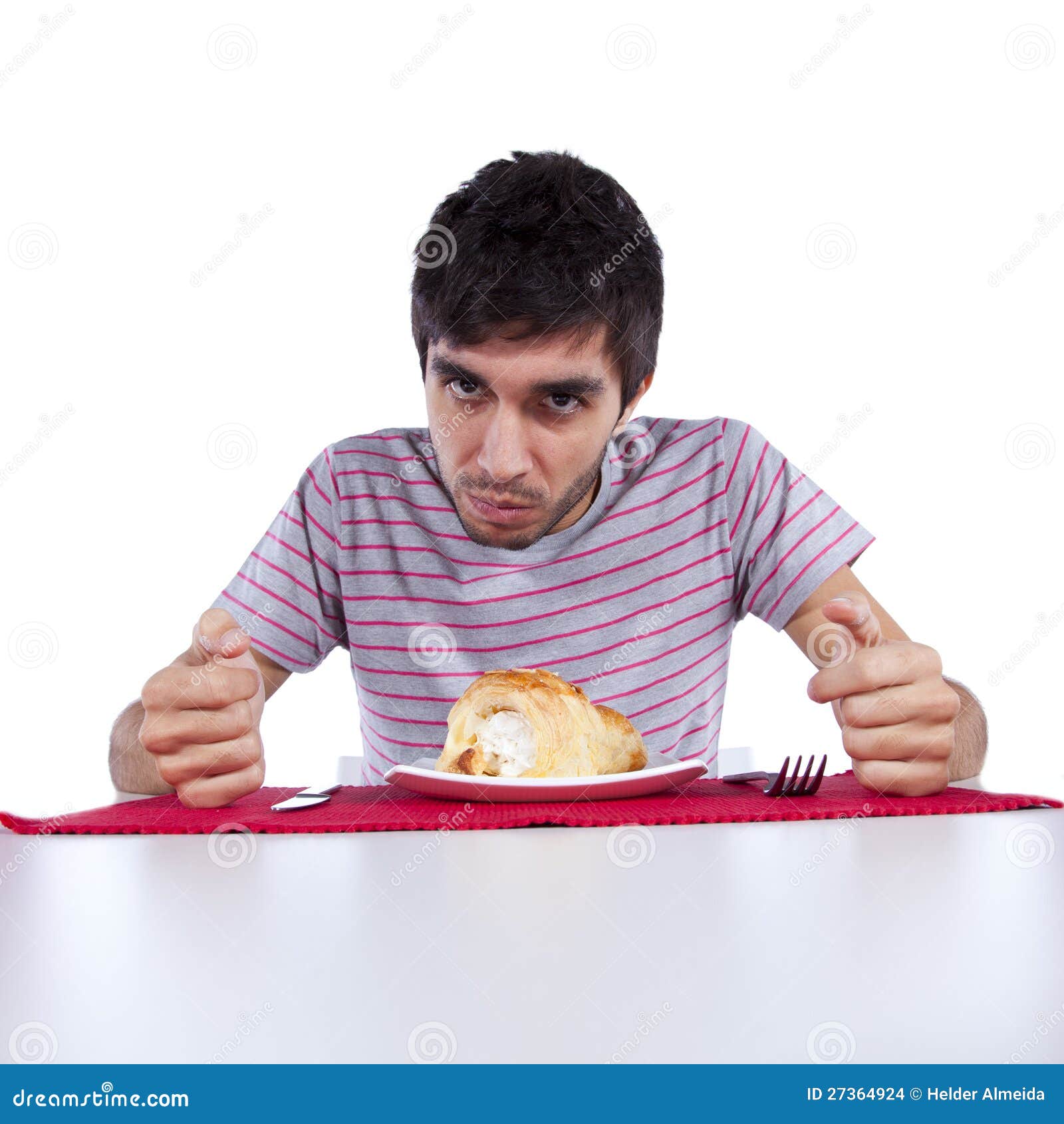 Young man eating a cake stock photo. Image of hungry - 27364924