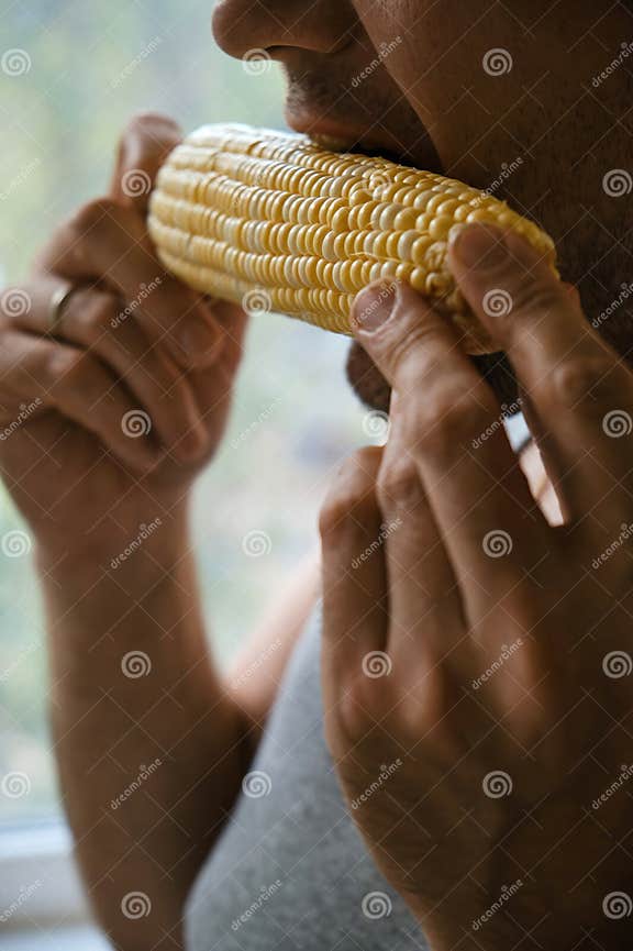 Young Man Eating Corn Close-up of an Unrecognizable Stock Photo - Image ...