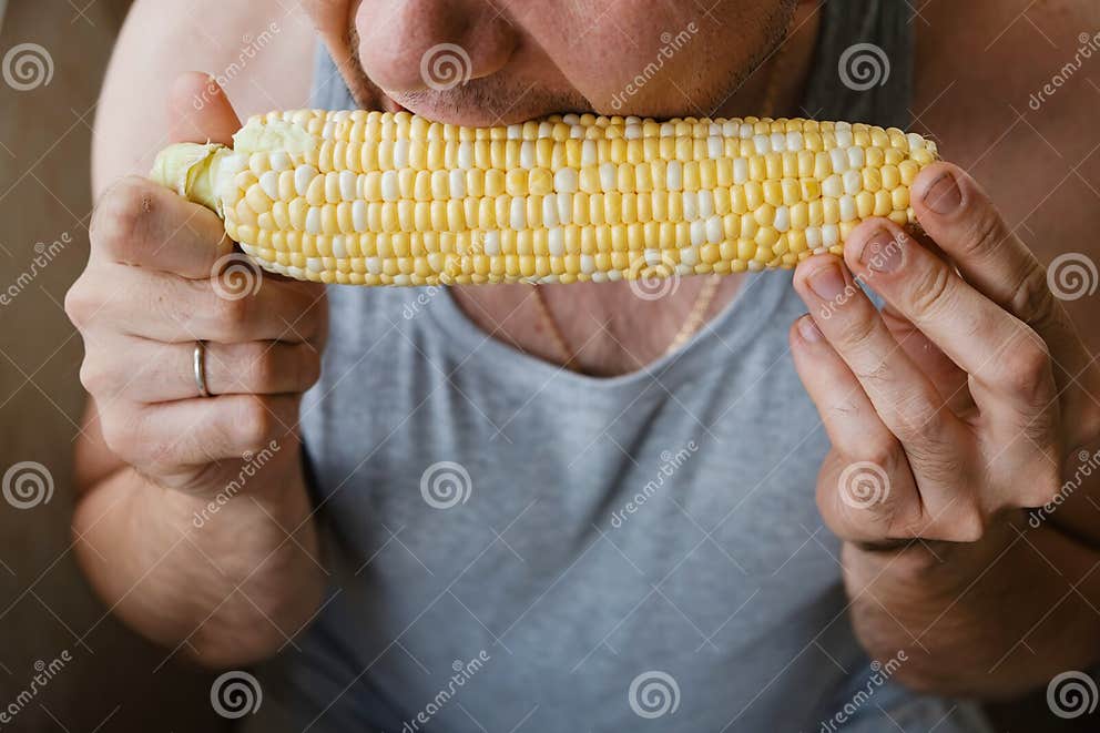 Young Man Eating Corn Close-up of an Unrecognizable Stock Photo - Image ...