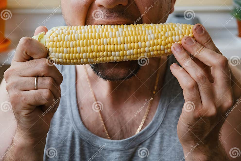 Young Man Eating Corn Close-up of an Unrecognizable Stock Image - Image ...